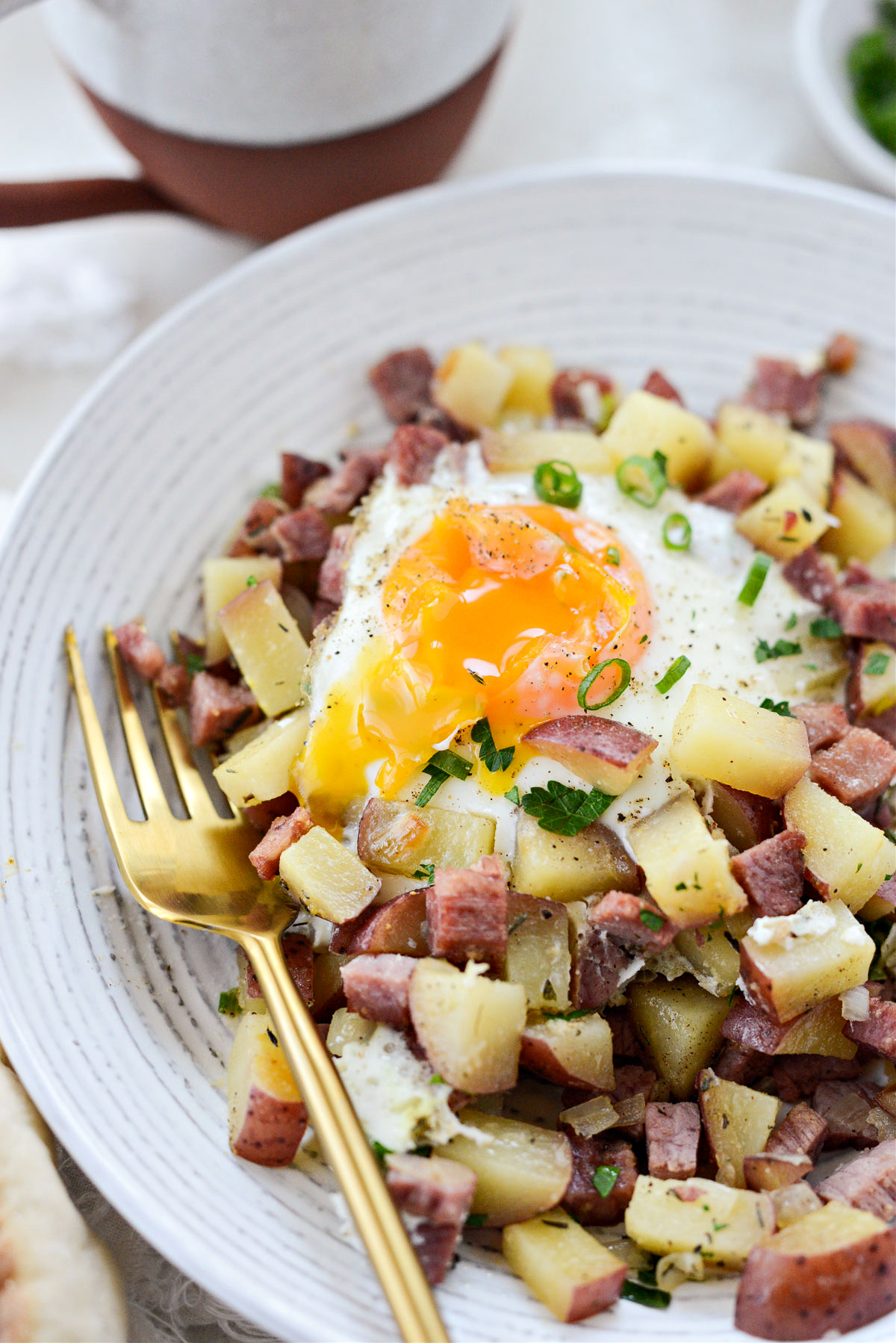 Easy Homemade Corned Beef Hash with Eggs - Simply Scratch