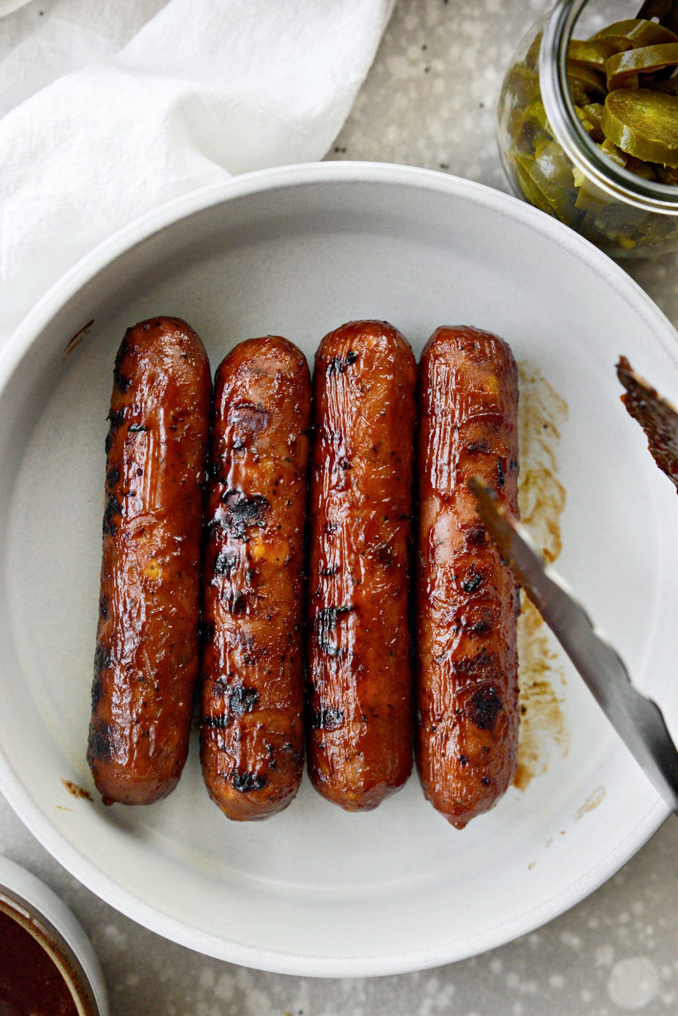 Grilled BBQ Sauce Chicken Brats - Simply Scratch